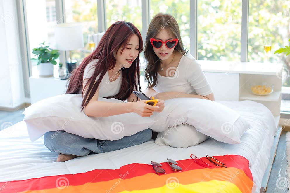 Asian Young Cheerful Female Lgbtq Lesbian Lover Couple Partner Smiling Trying Funny Sunglasses