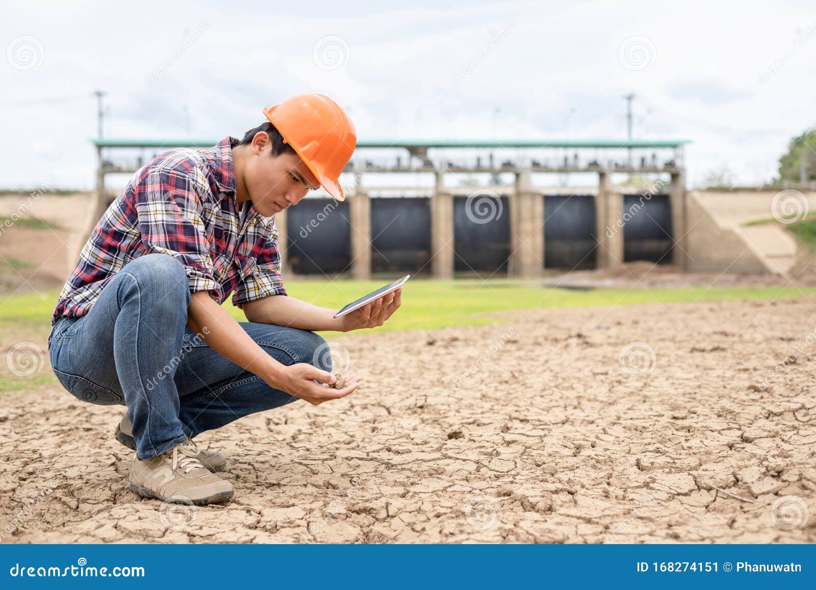 Young Engineer Working on Site at the Dam Stock Image - Image of care ...