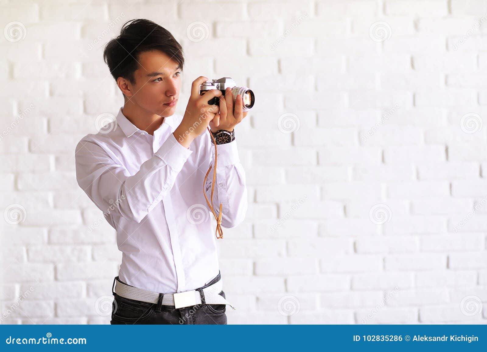 Asian Young Man with a Camera Stock Photo - Image of body, holding ...