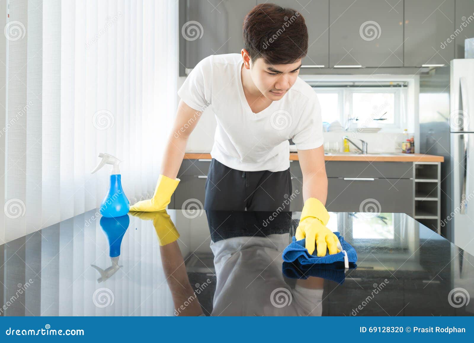 Asian Young Man Cleaning Modern Kitchen at Home Stock Photo - Image of ...
