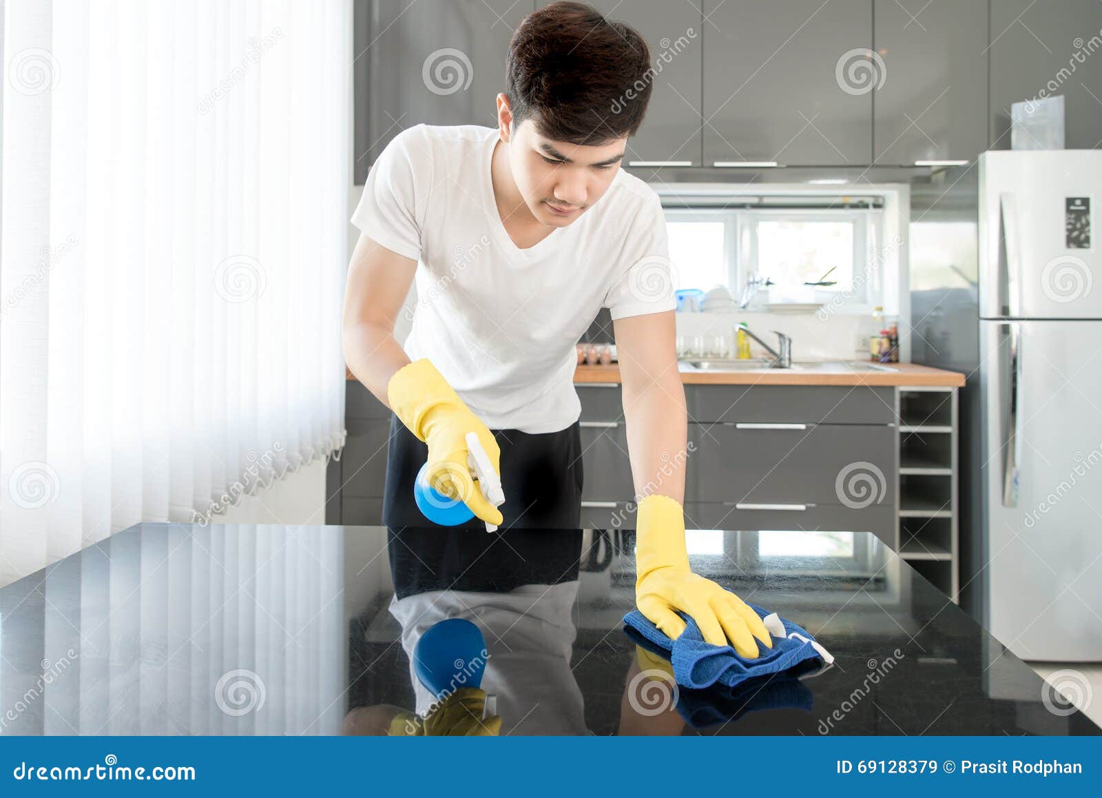 Asian Young Man Cleaning Modern Kitchen at Home Stock Image - Image of ...