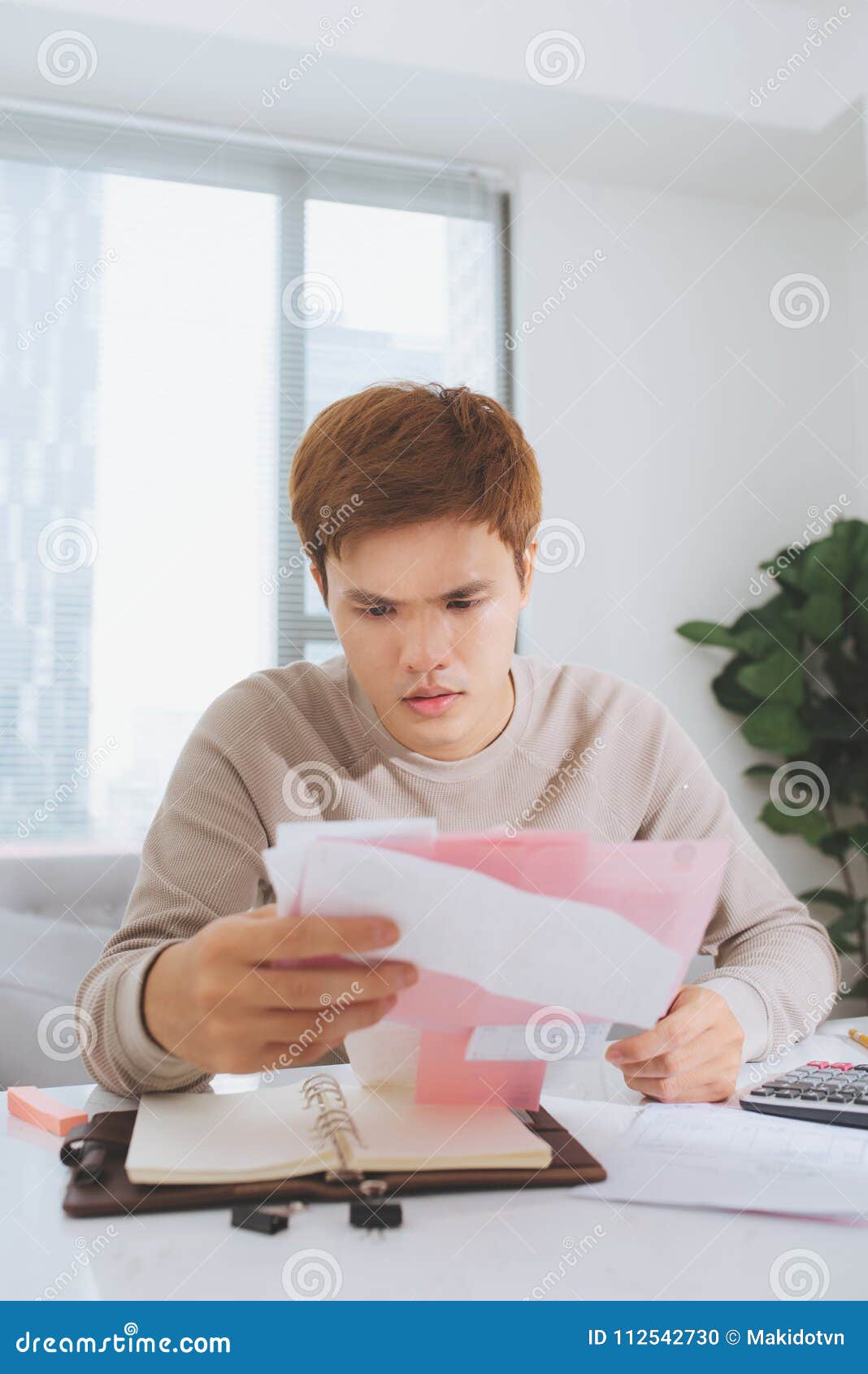 Asian Young Man Counting Using Calculator and Stress in Problem Stock ...