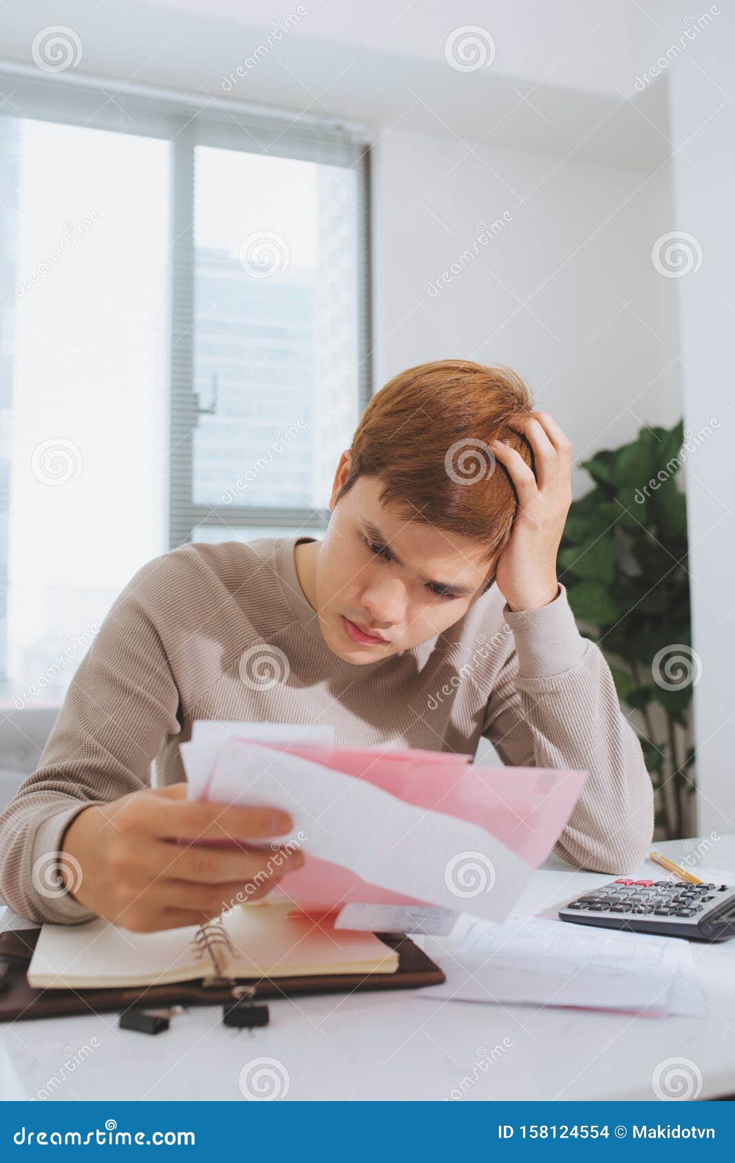 Asian Young Man Counting Using Calculator and Stress in Problem with ...