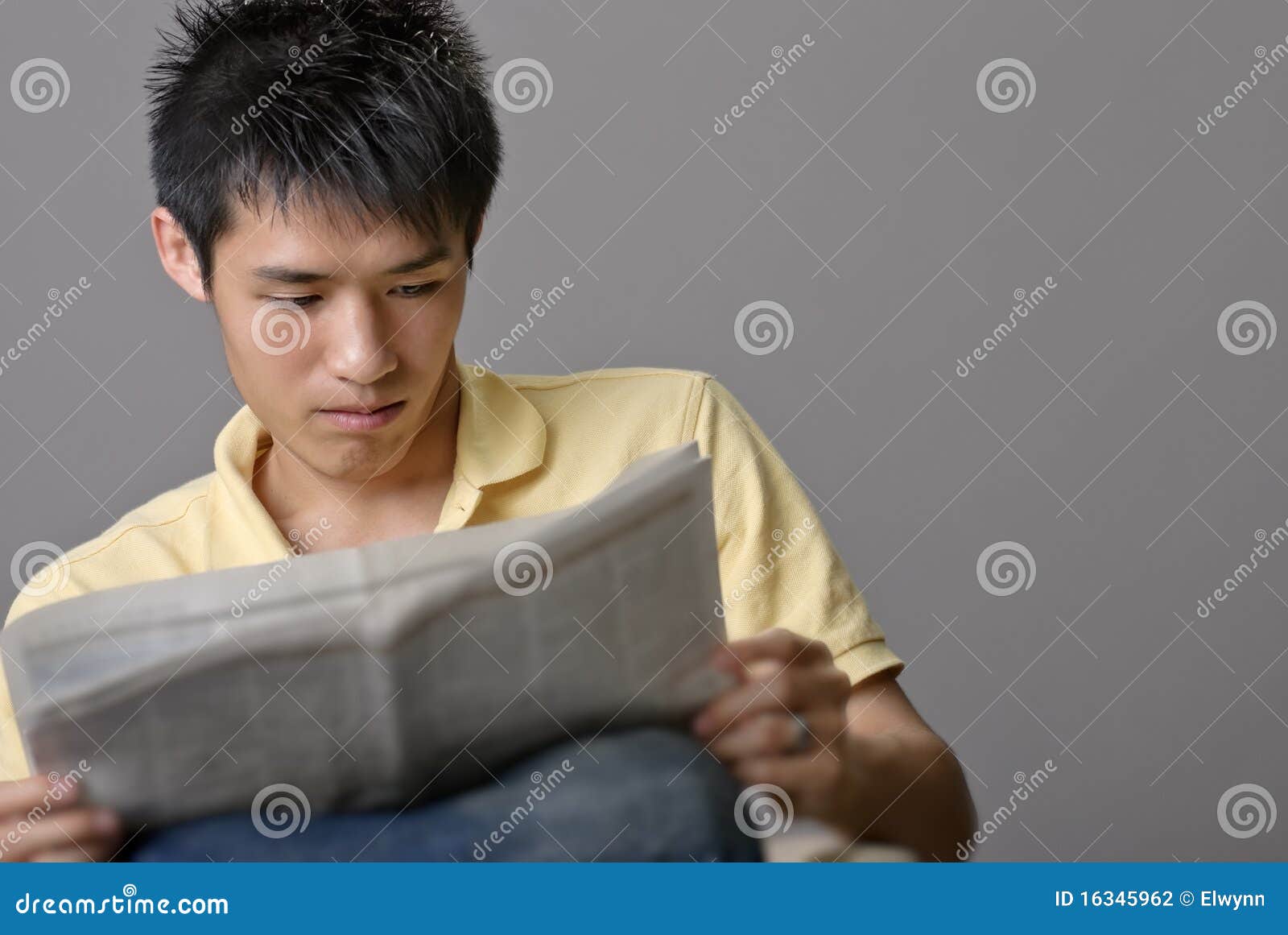 Asian Young Man Reading Newspaper Stock Photo - Image of look, news ...