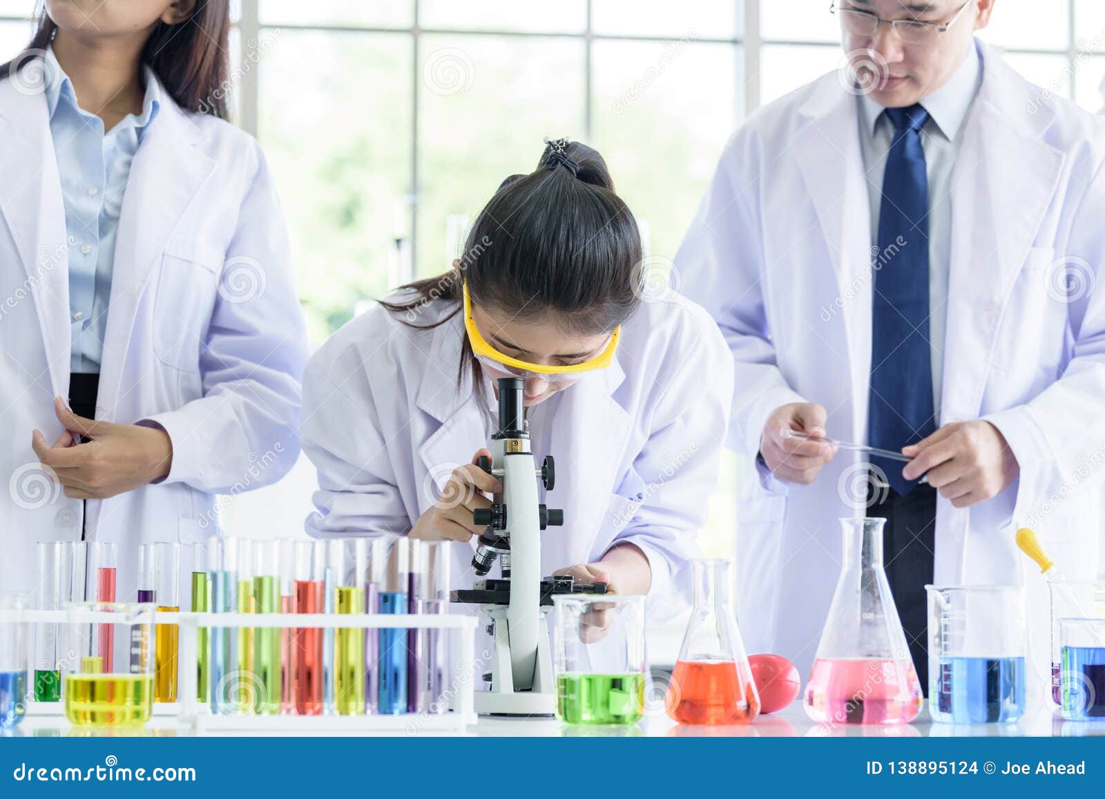 Asian Young Student Scientist Researching and Learning with Senior ...