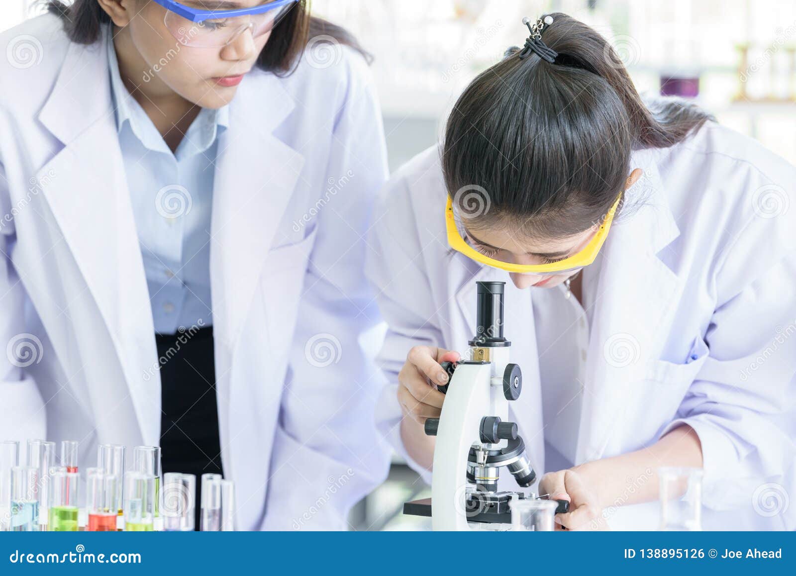 Asian Young Student Scientist Researching and Learning with Senior ...