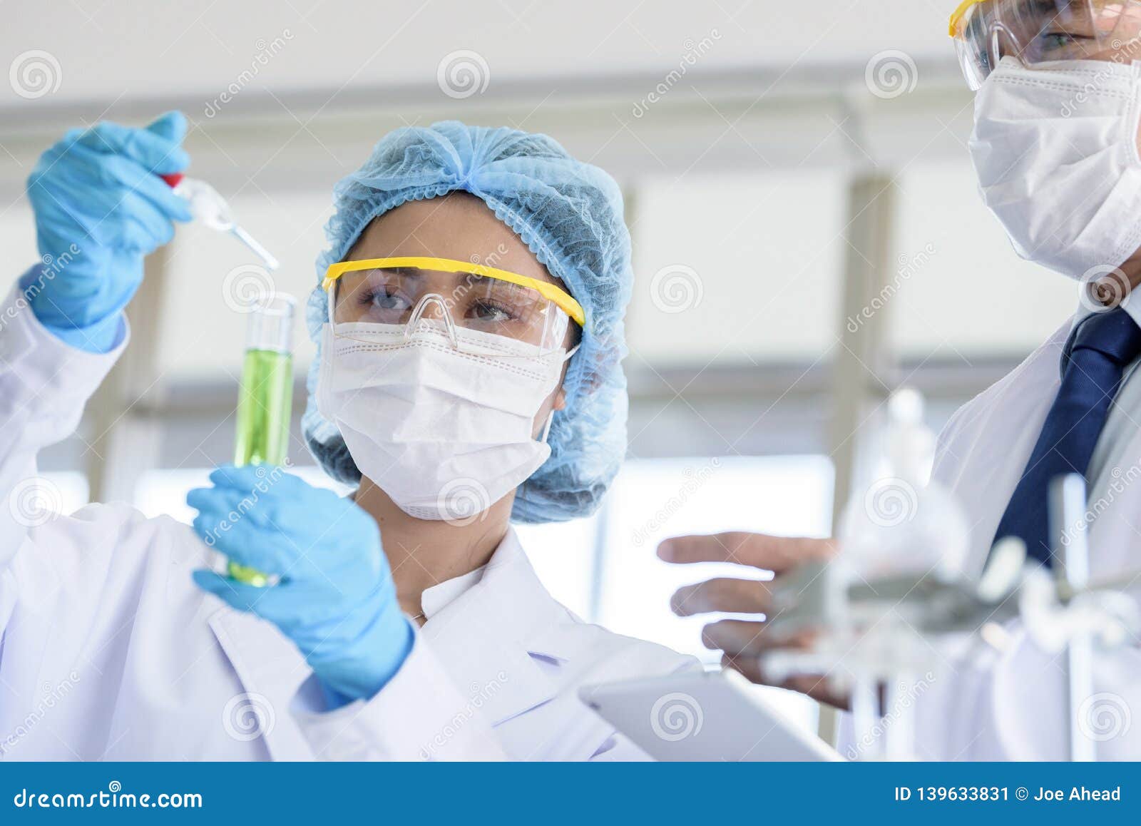 Asian Young Student Scientist Researching and Learning with Senior ...