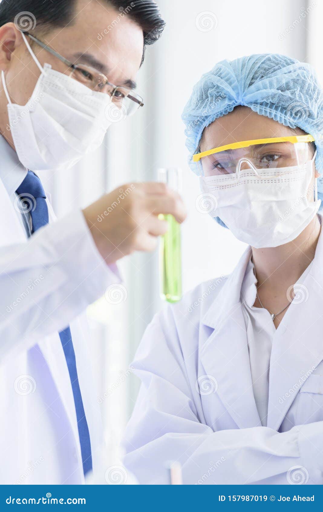 Asian Young Student Scientist Researching and Learning with Senior ...