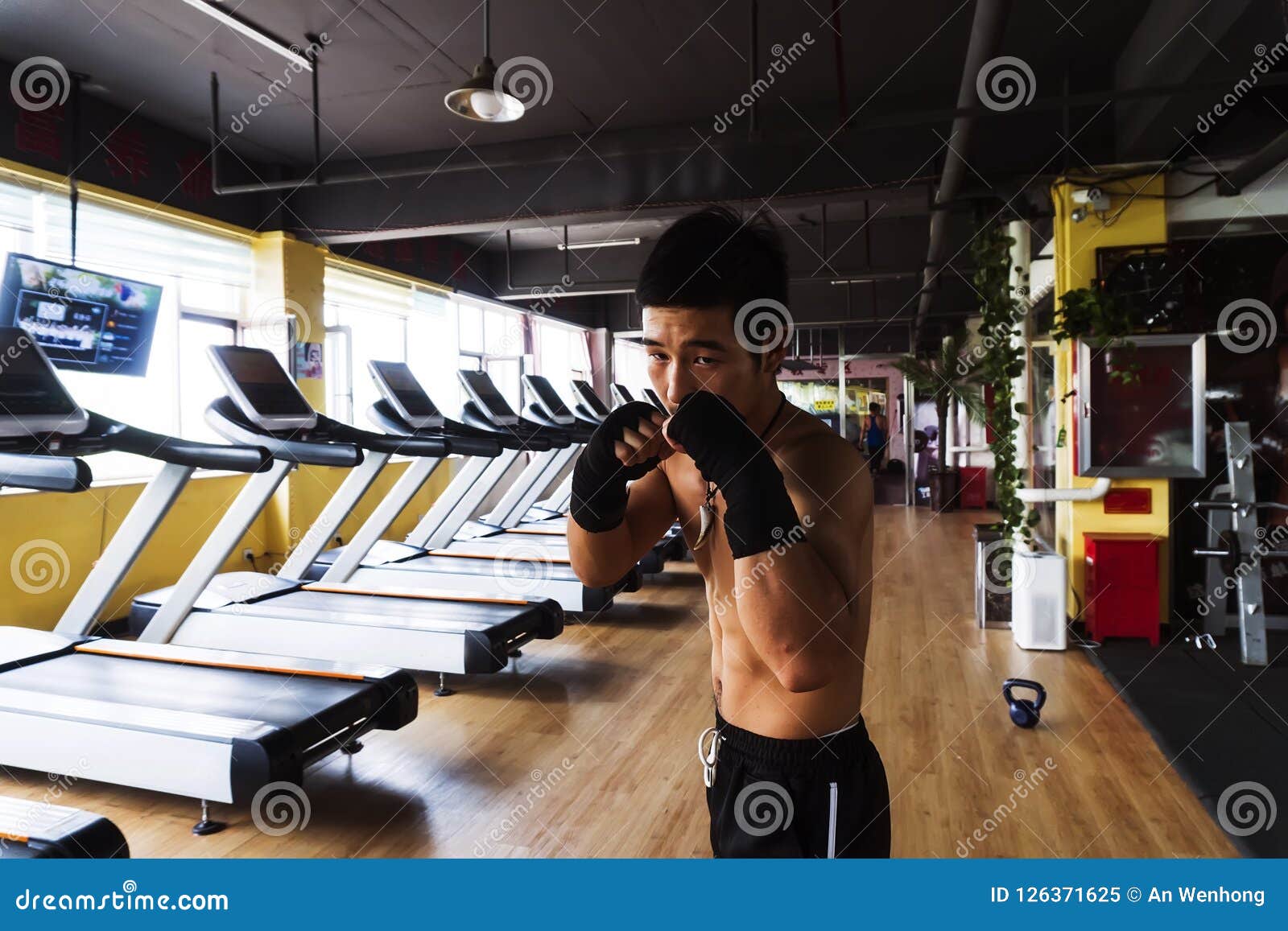 Asians Man Boxing at Gym stock image. Image of effort - 126371625