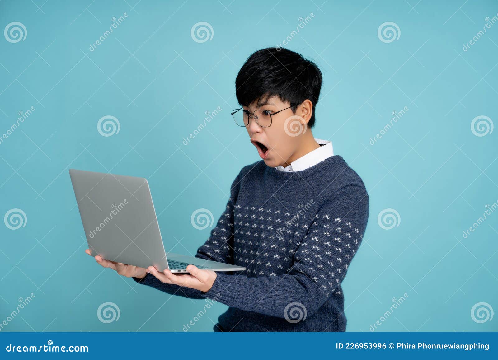Asians Shocked and Holding Laptop Computer Stock Photo - Image of ...