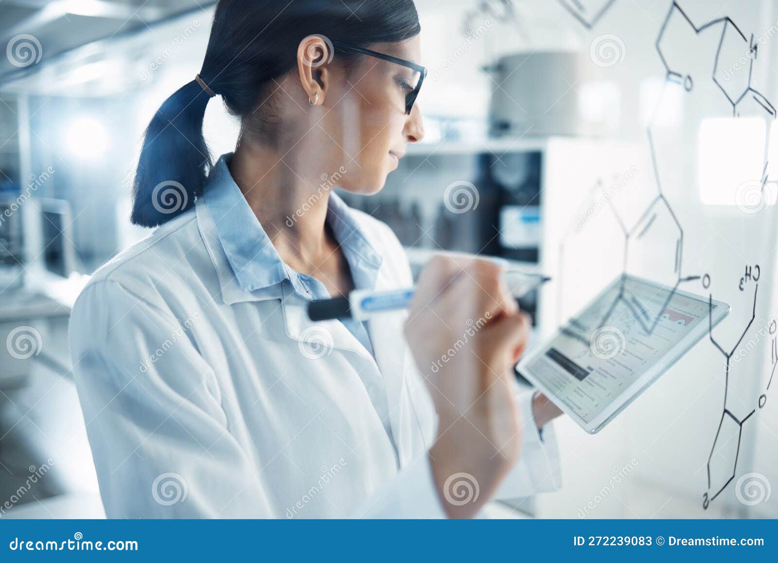 .Ask Her, Shell Have the Answer. a Young Scientist Solving Equations on ...