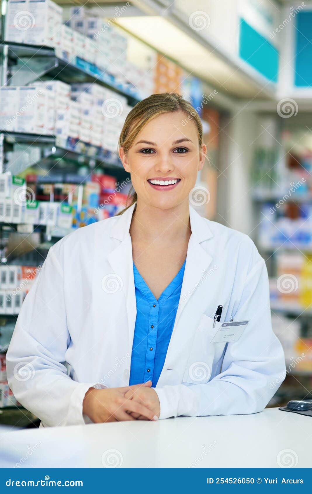 Ask Me, Im a Pharmacist. Portrait of a Happy Young Woman Working in a ... Ask Me, Im a Pharmacist. Portrait of a Happy Young Woman Working in a ...