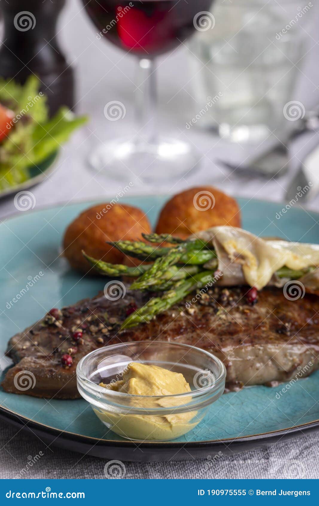 Asparagus on a steak stock image. Image of mustard, juicy - 190975555