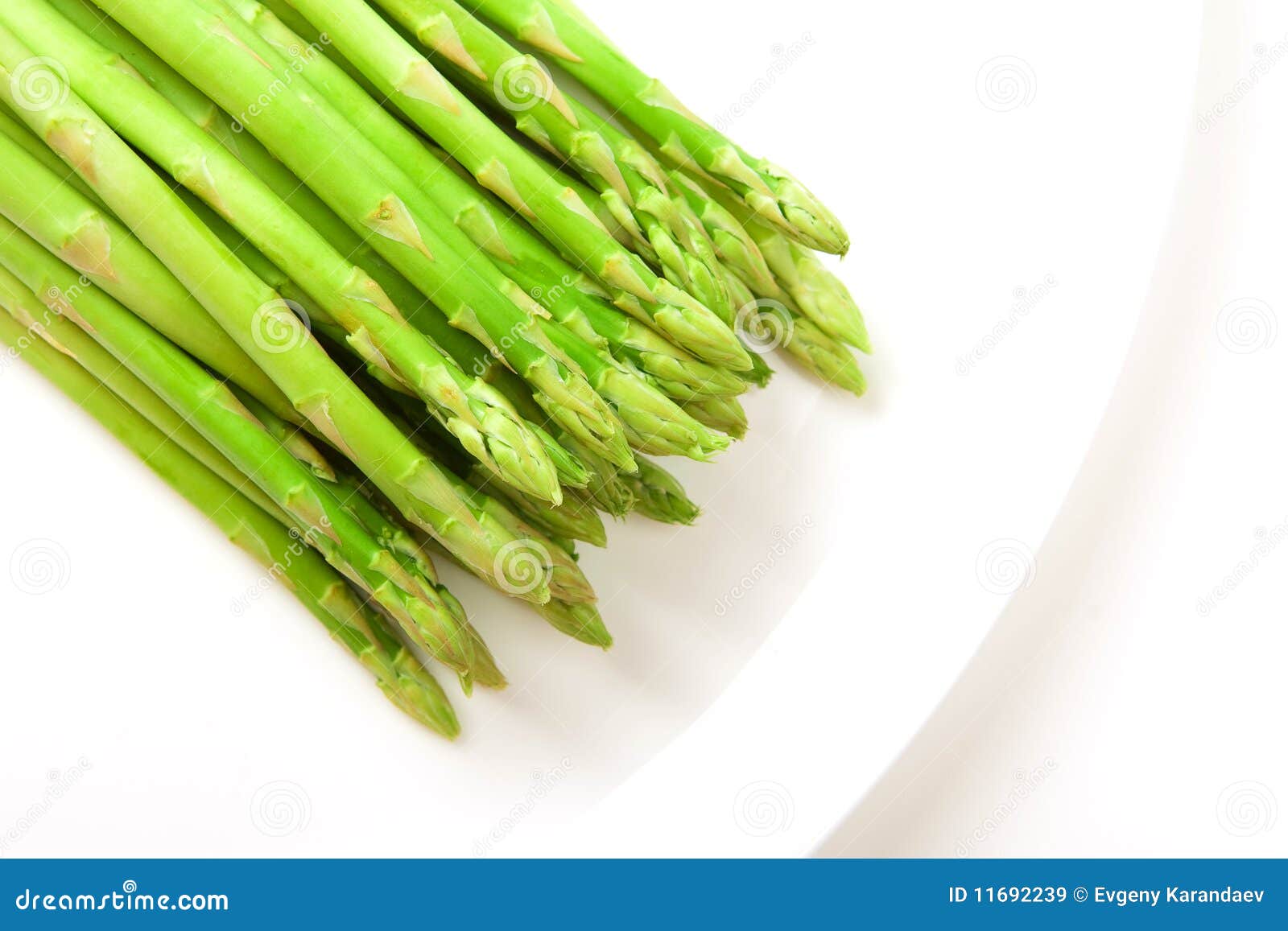 Asparagus on white plate stock image. Image of vegetable - 11692239