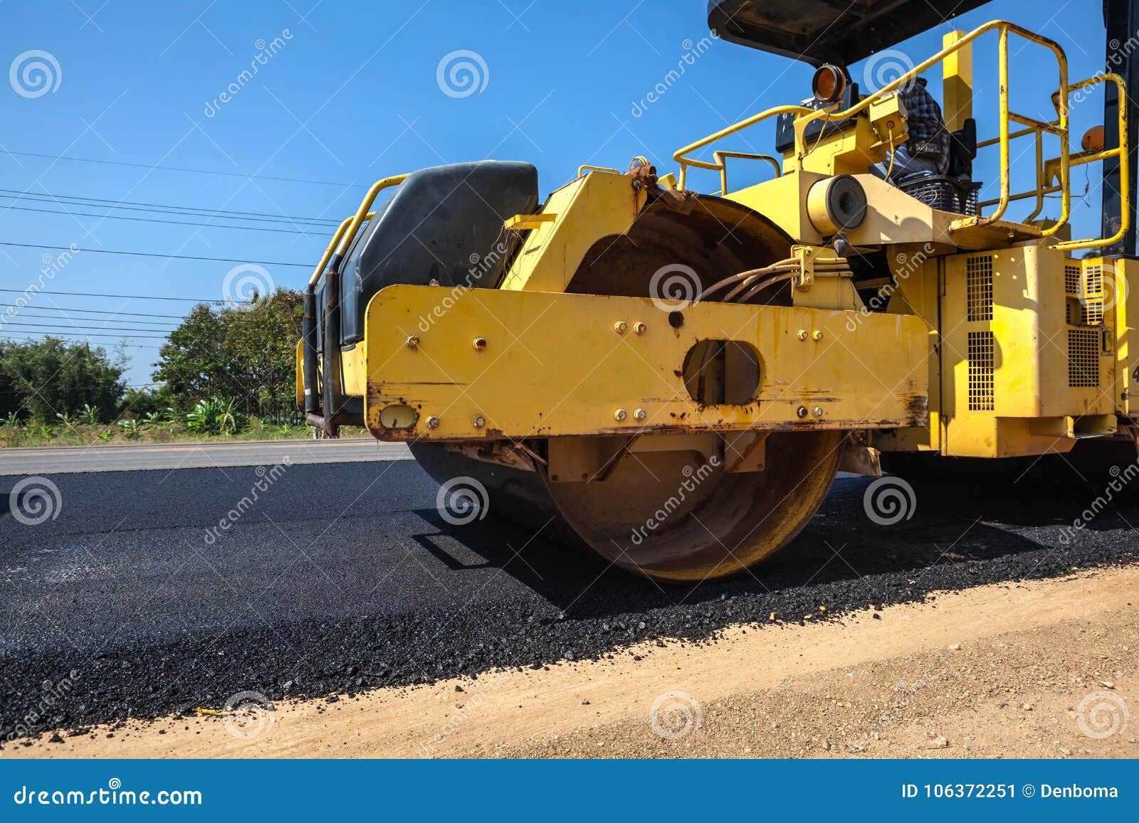 An asphalt roller stock image. Image of machinery, highway - 106372251