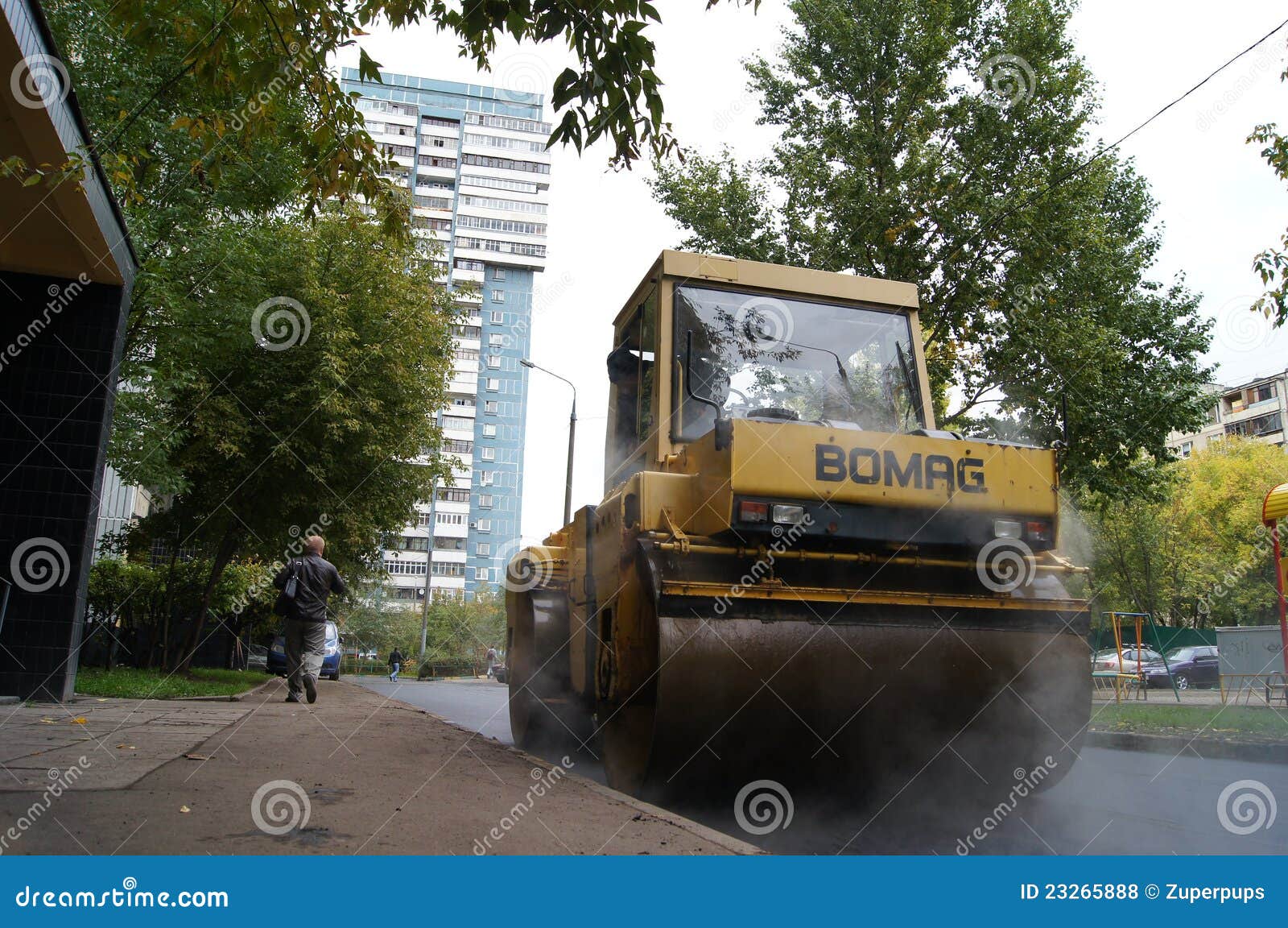 Asphalt covering editorial stock photo. Image of operator - 23265888
