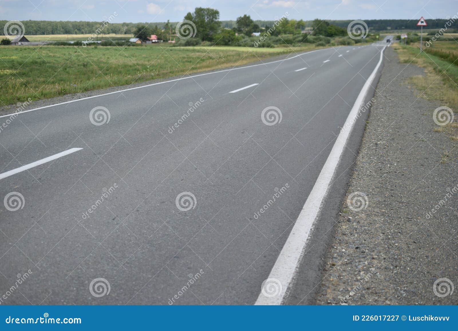Asphalt Expressway on a Summer Day with Clouds Stock Image - Image of ...