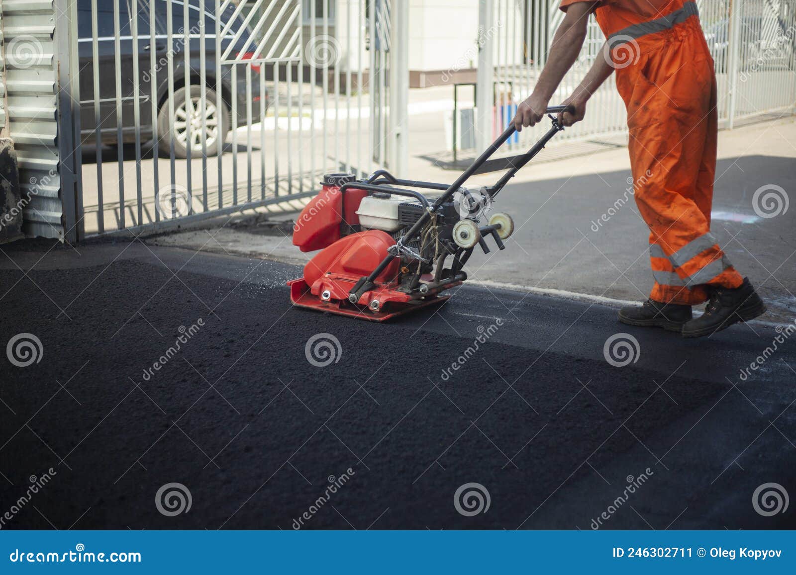 Asphalt Laying. Leveling the Road Stock Image - Image of leveling ...