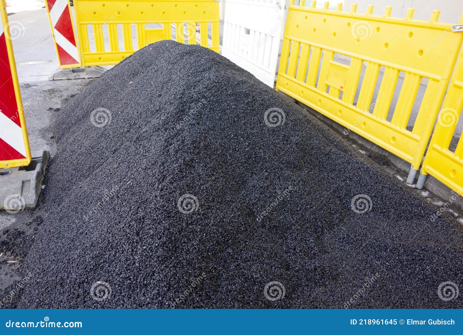 Boiling Hot Asphalt Is Filled Into A Bucket From An Asphalt Machine To ...