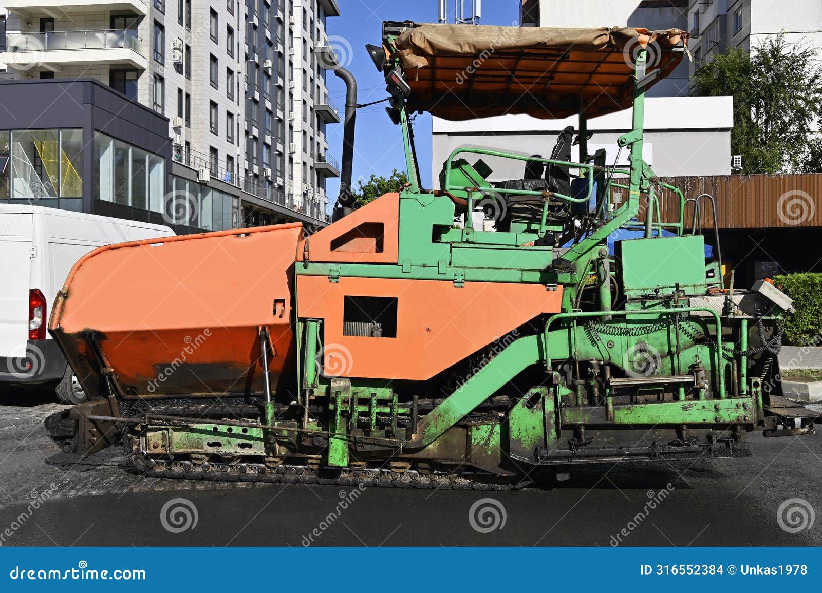 Asphalt paver machine stock photo. Image of industry - 316552384
