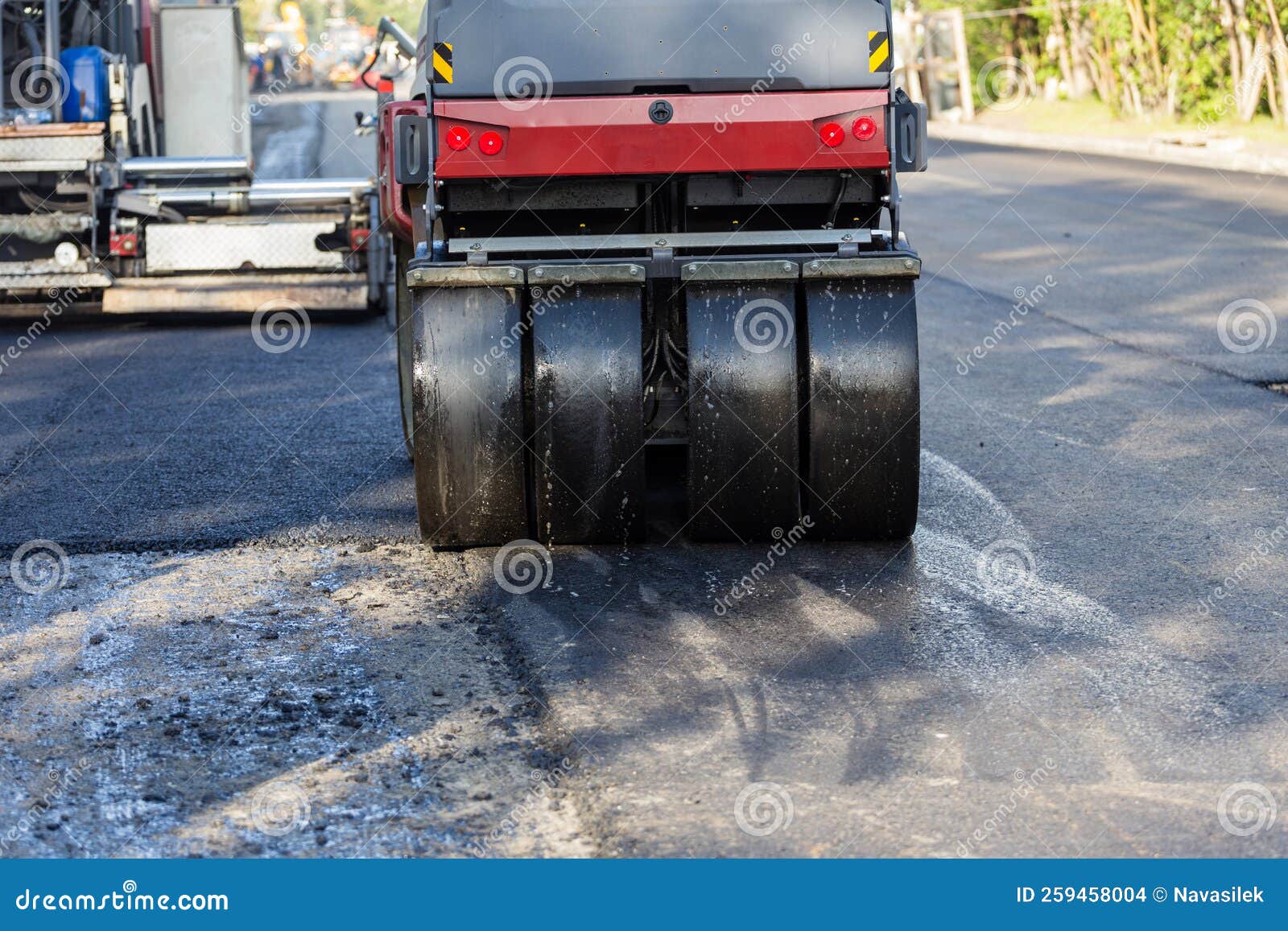 Asphalt Paver Wheels Front View Stock Photo - Image of blacktop, fresh ...