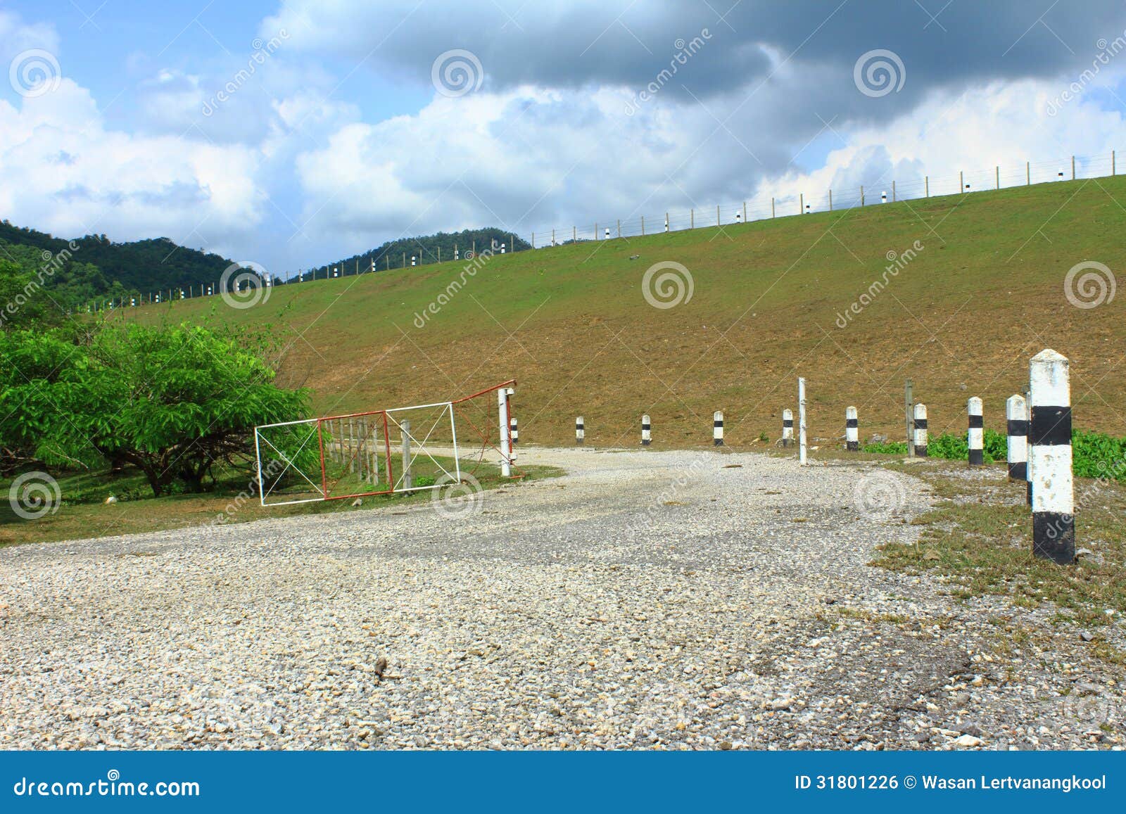 Asphalt Road Along Protective Dam Stock Photo - Image of rain, soil ...