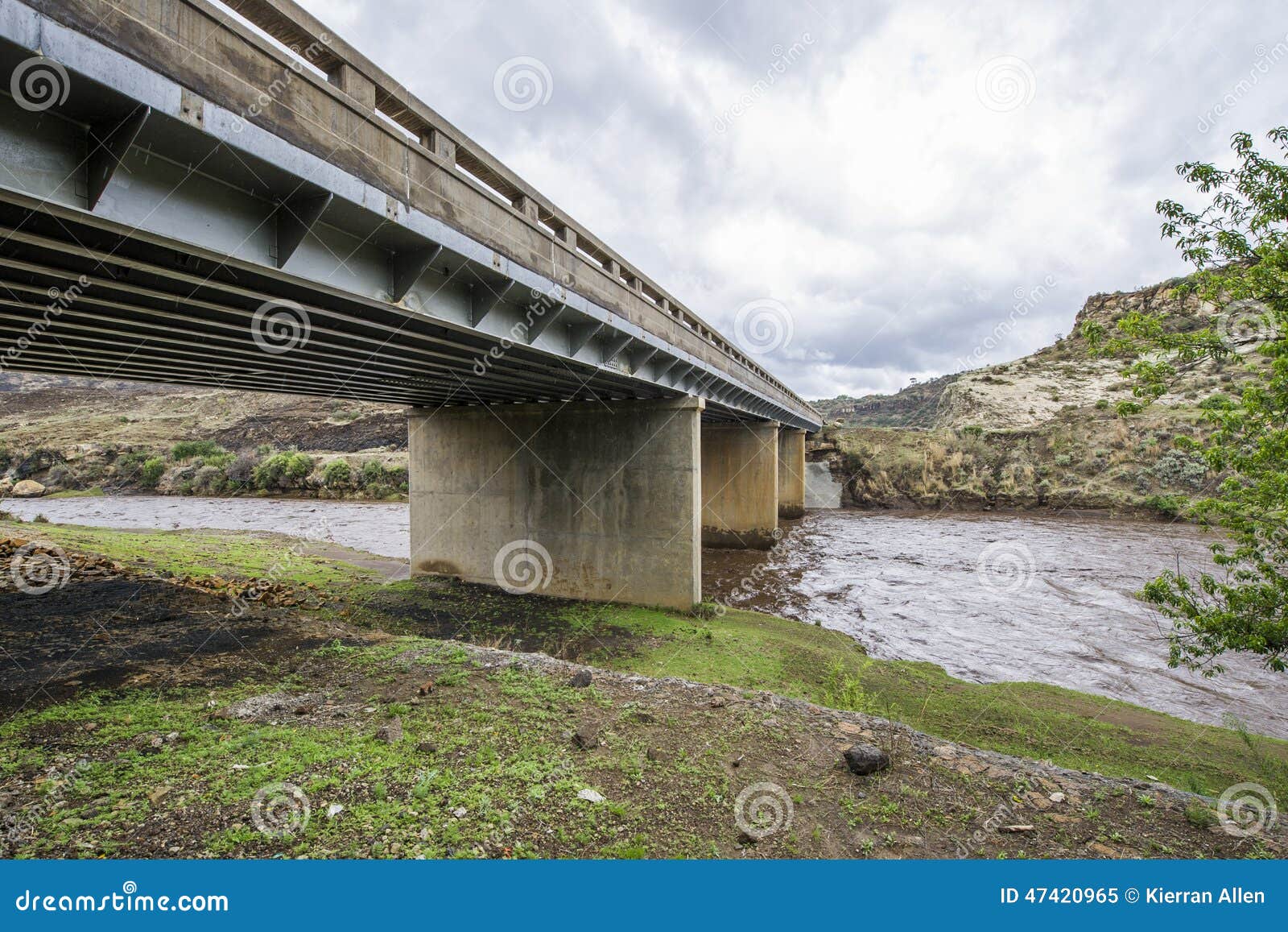 Asphalt Road and Bridge Leading into the Distance Stock Image - Image ...