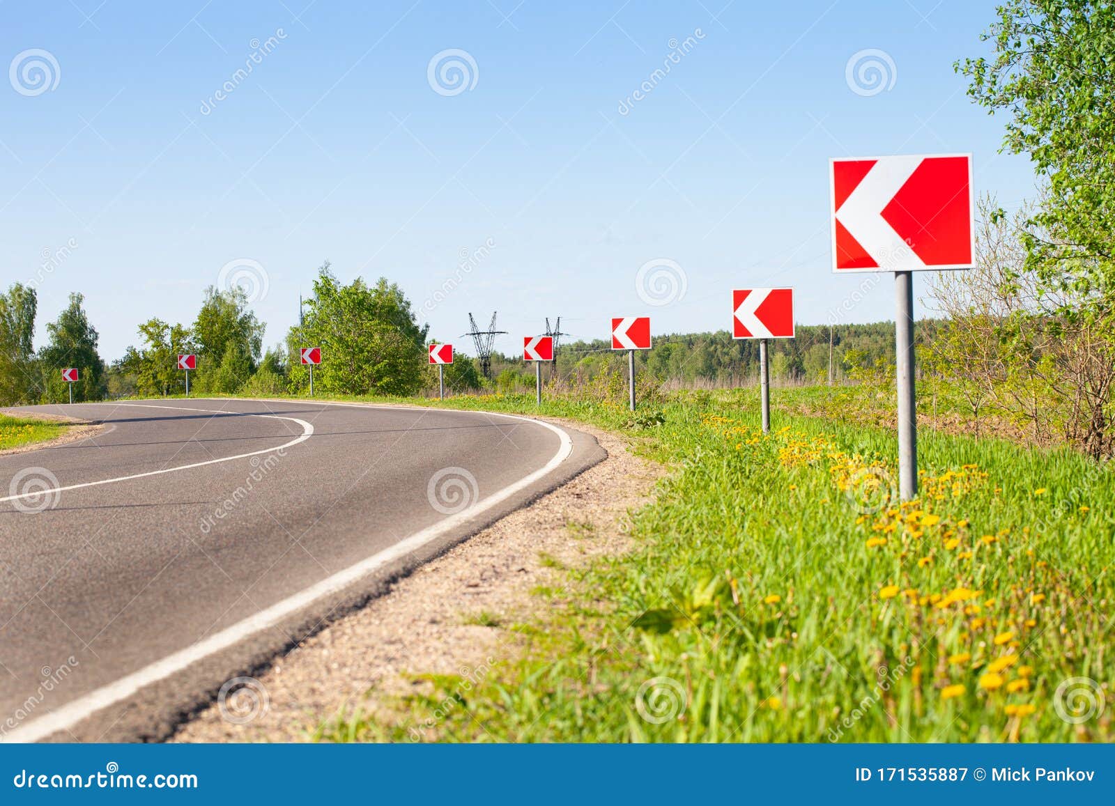 Asphalt Road with Bright Traffic Signs in Situ of the Sharp Left Turn ...