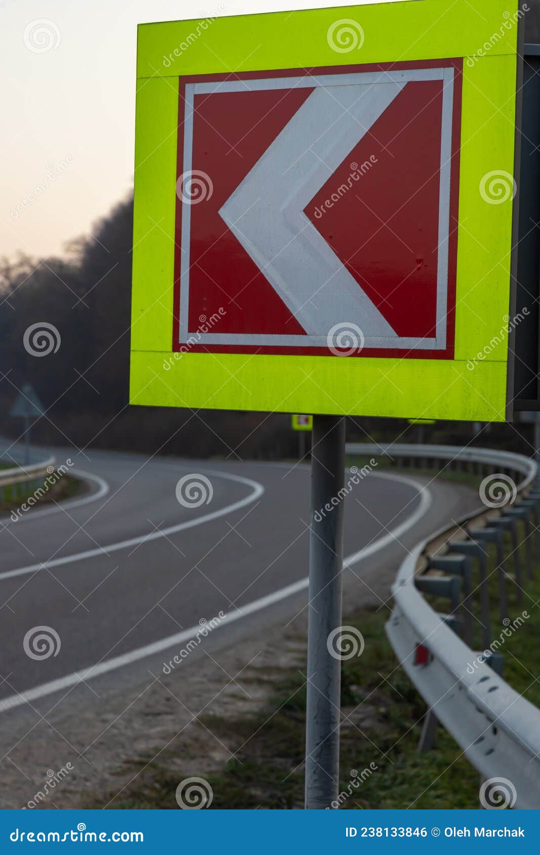 Asphalt Road with Bright Traffic Signs in Situ of the Sharp Left Turn ...