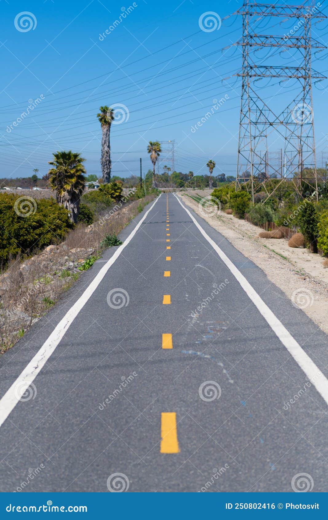 Asphalt Road with Pylon on Roadside in Countryside Stock Photo - Image ...