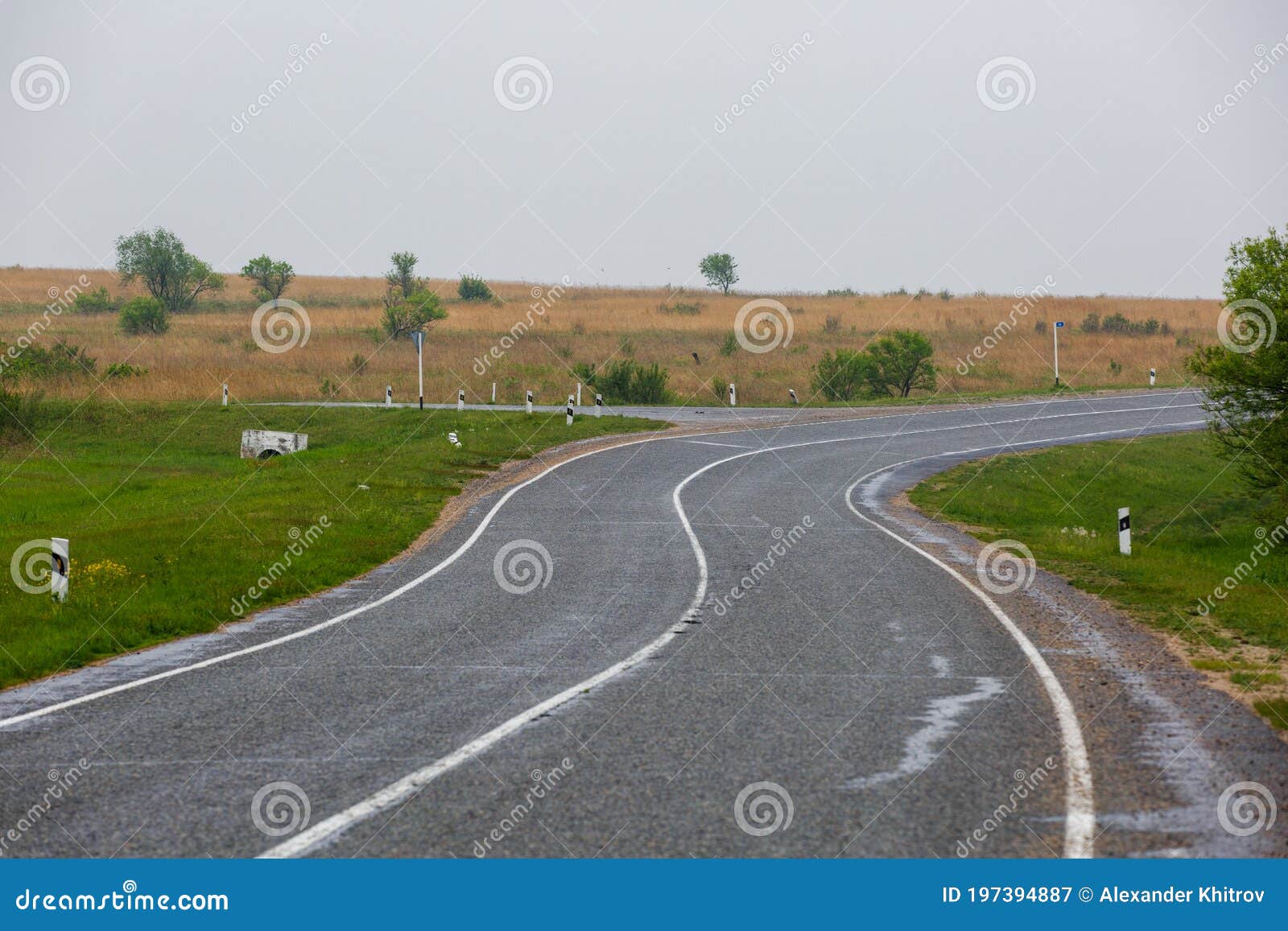 Asphalt Road Receding into the Distance among Green Fields Stock Image ...