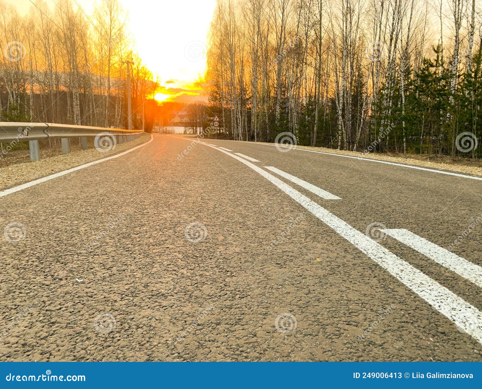 Asphalt road in sunshine stock image. Image of asphalt - 249006413