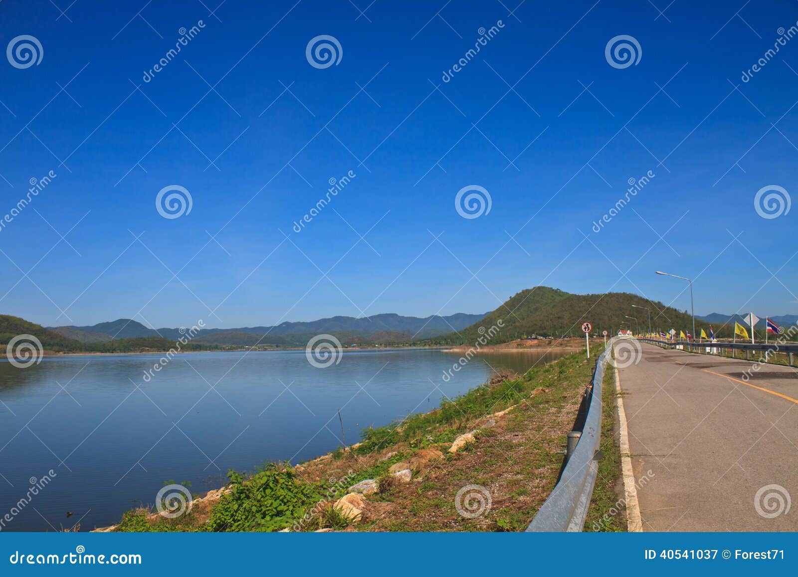 Asphalt road on top of DAM stock image. Image of cloudy - 40541037
