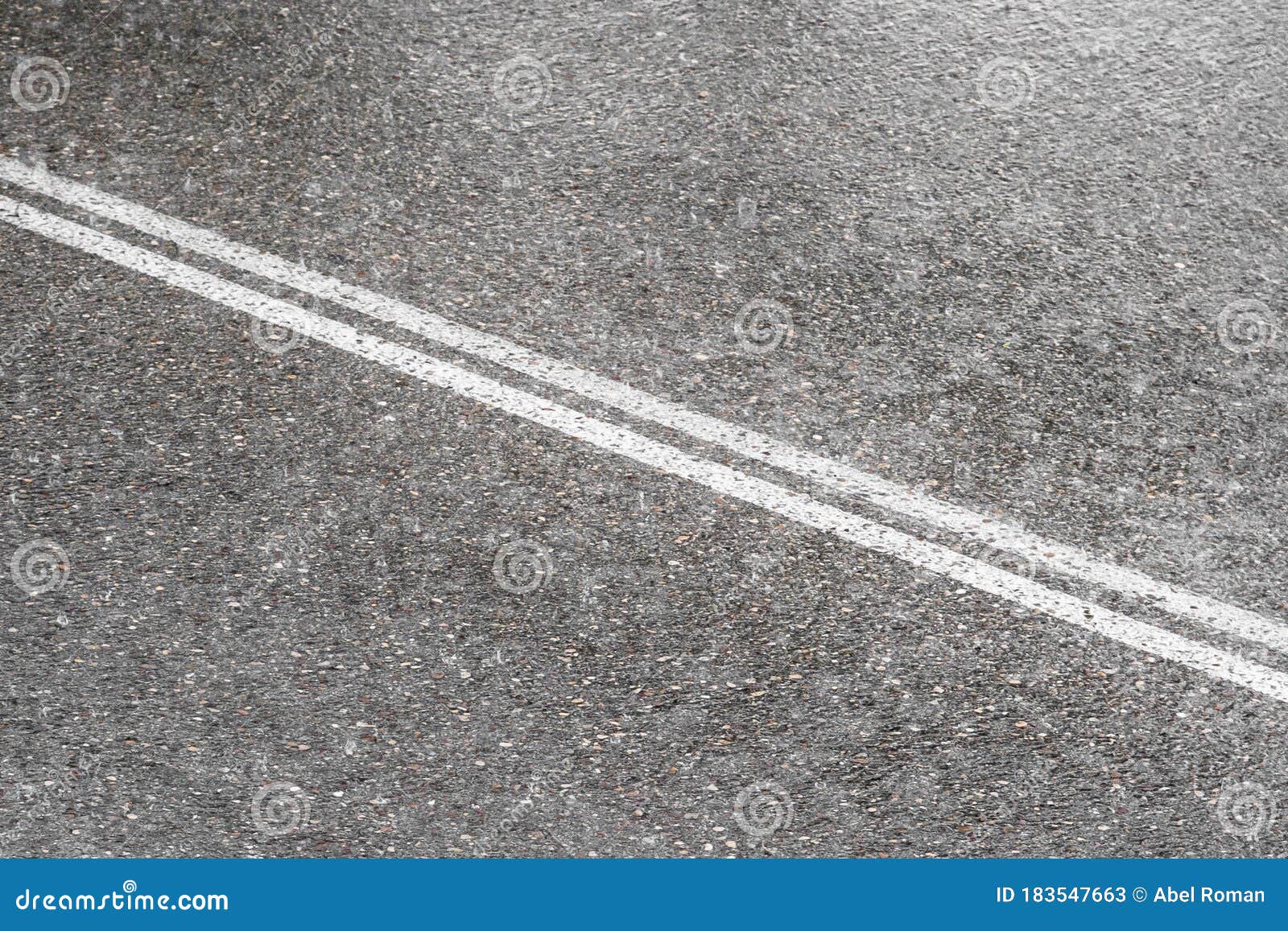 Asphalt of a Road with Two Continuous White Lines Wet As the Drops ...