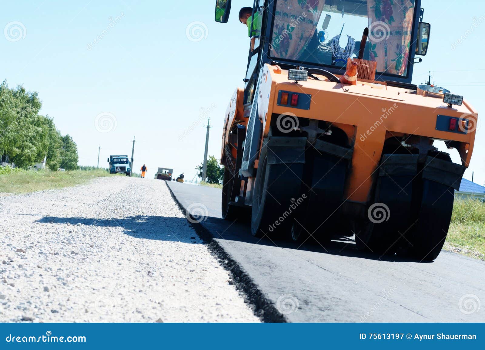 Asphalt roller paving stock image. Image of countryside - 75613197