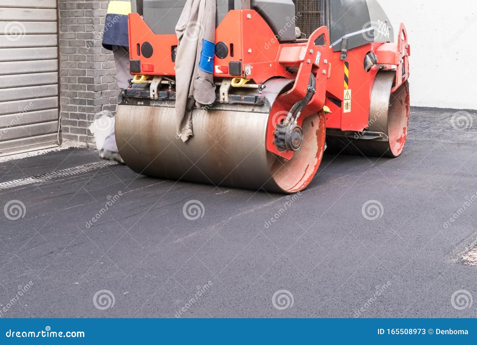 An asphalt roller stock image. Image of paving, asphalt - 165508973