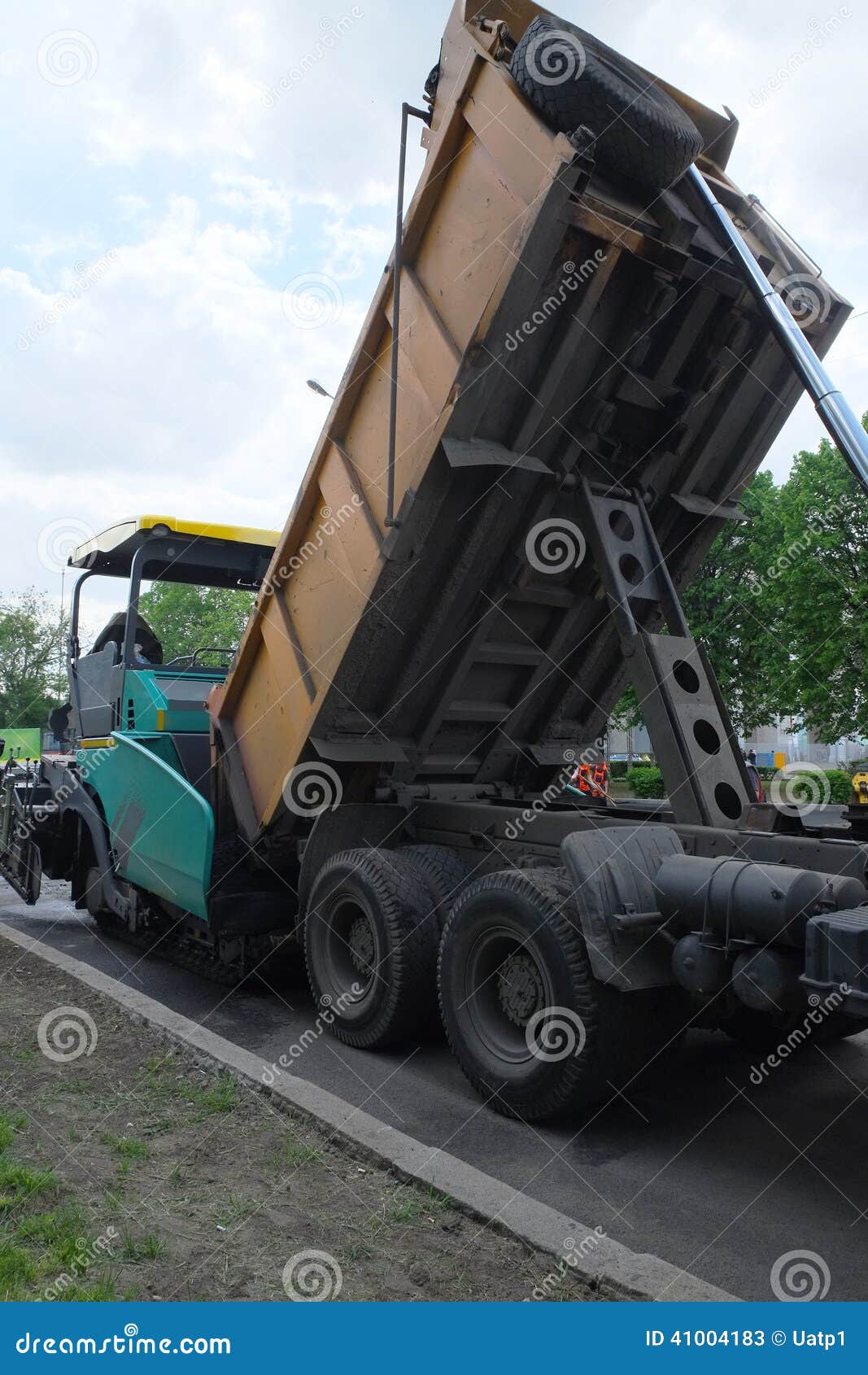 Asphalt spreading machine stock image. Image of operator - 41004183