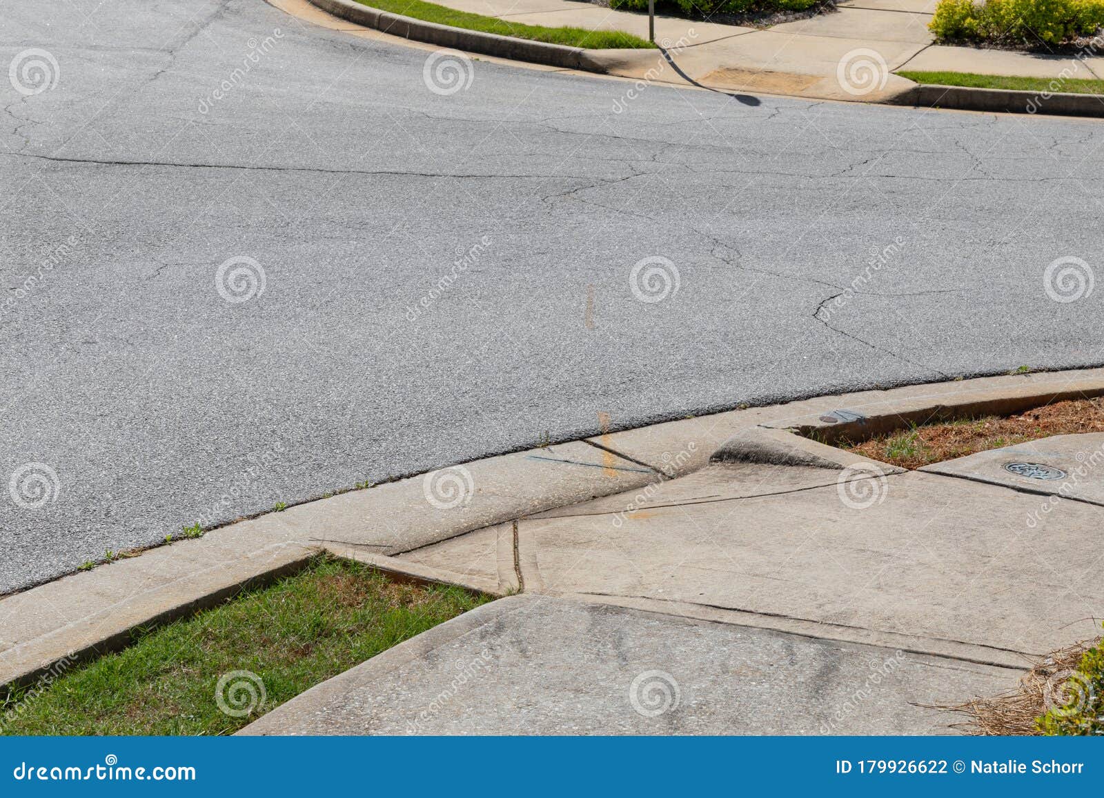 Asphalt Street Bordered by Formed Curbs, Sidewalks, and Grass, Handicap ...