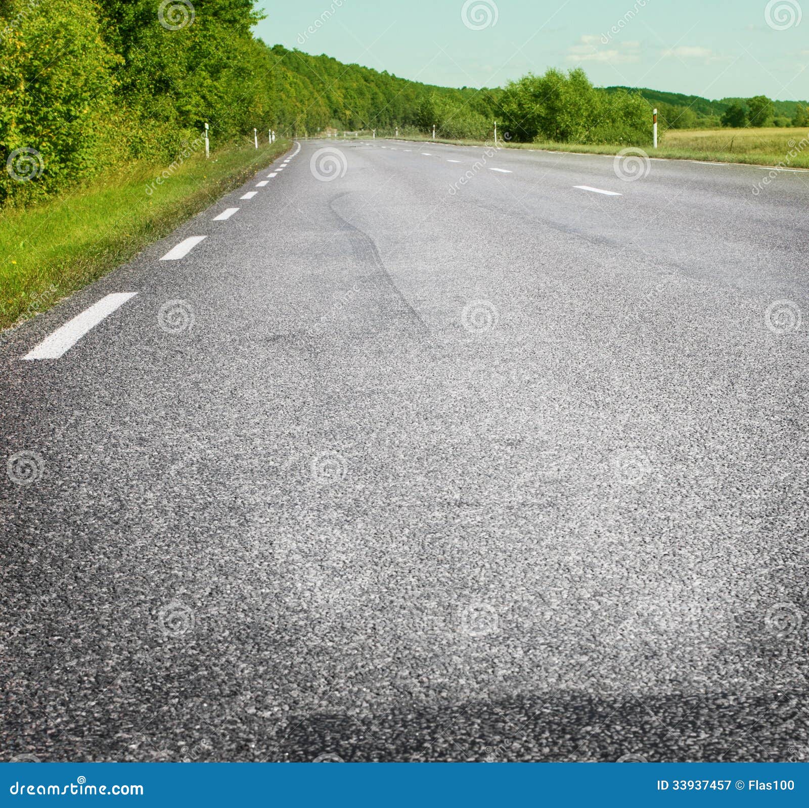 Asphalted Road with Green Grass Stock Image - Image of motion, roadway ...