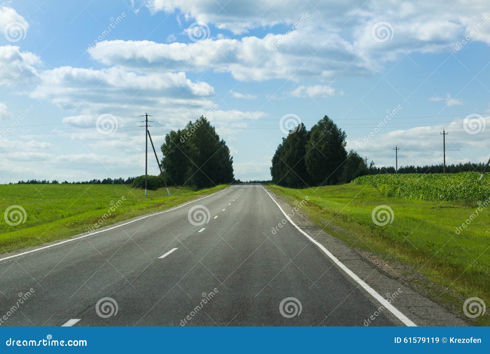 The Asphalted Way Paved Along Fields Stock Image - Image of national ...