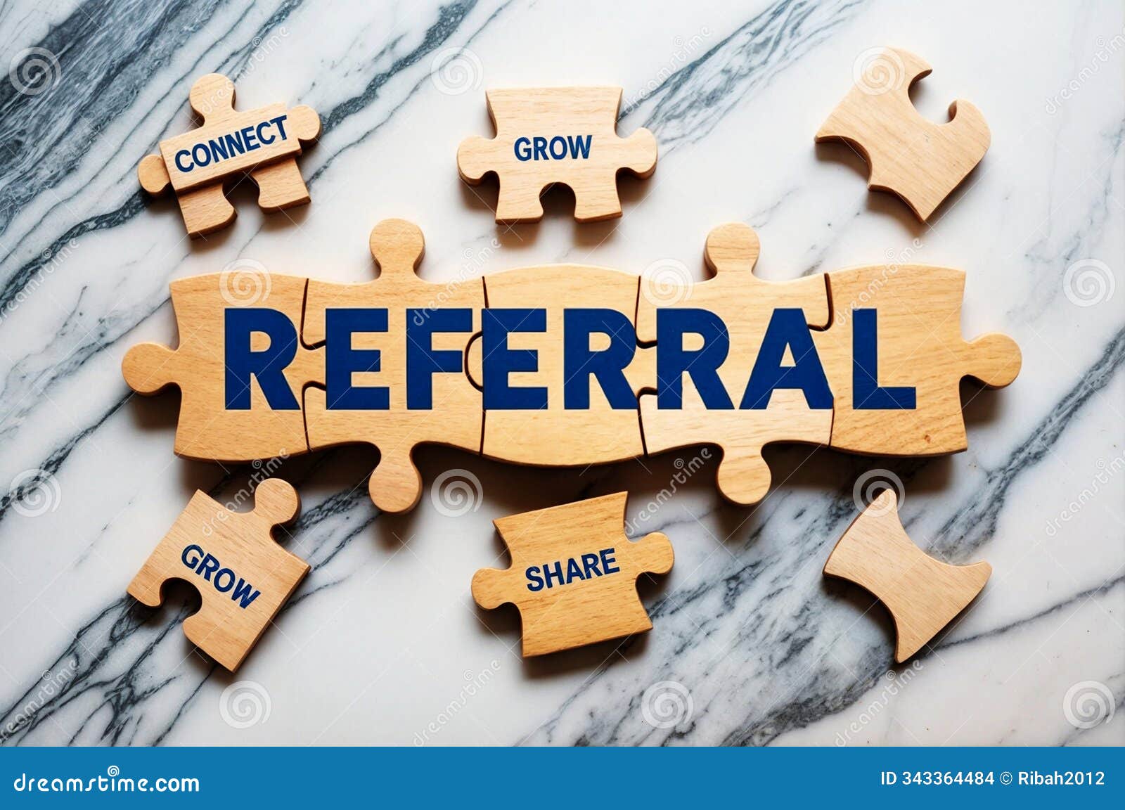 A Assembled And Completed Puzzle Pieces With The Word Text "REFERRAL ...