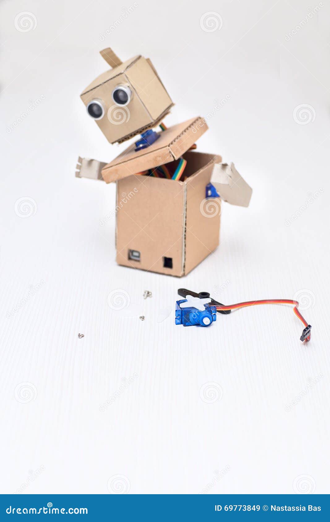 Assembling Cardboard Robot And The Necessary Details Royalty-Free Stock ...