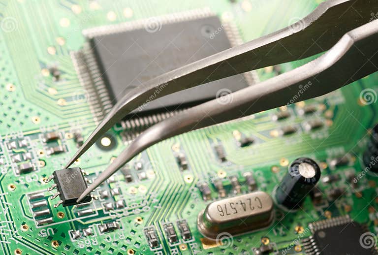 Assembling a circuit board stock photo. Image of pincer - 13209842