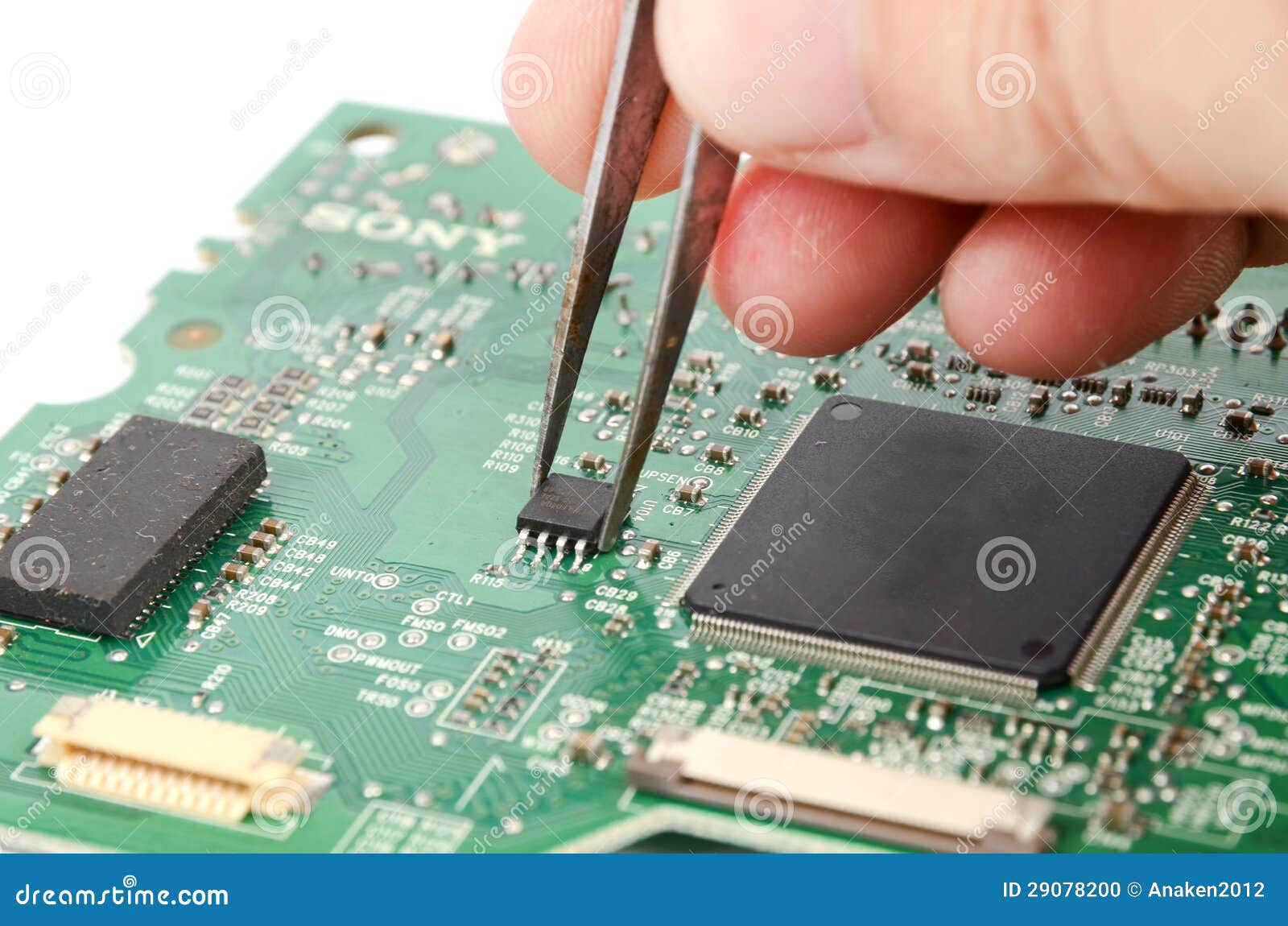 Assembling a circuit board stock photo. Image of macro - 29078200