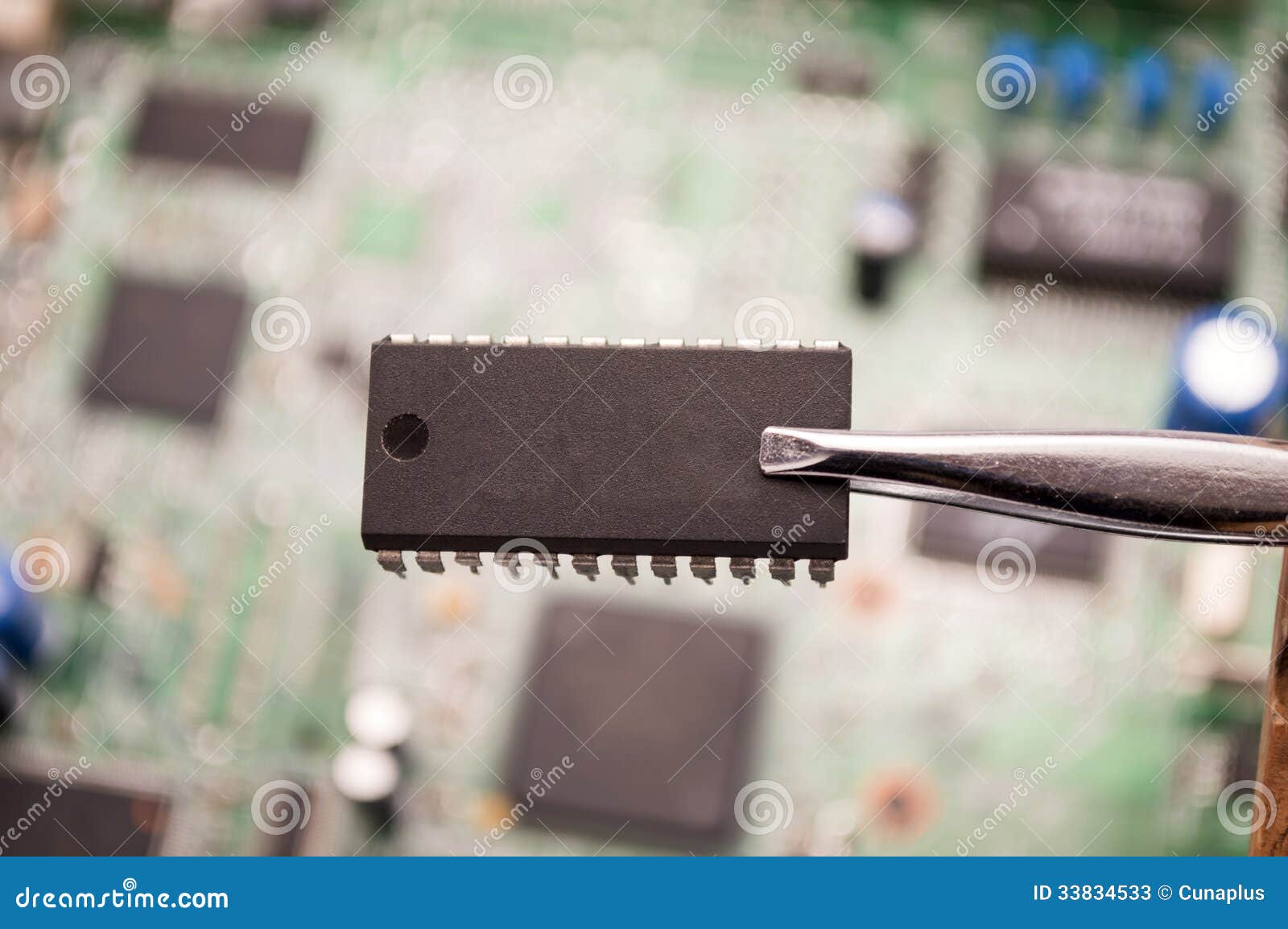 Assembling a circuit board stock image. Image of pliers - 33834533