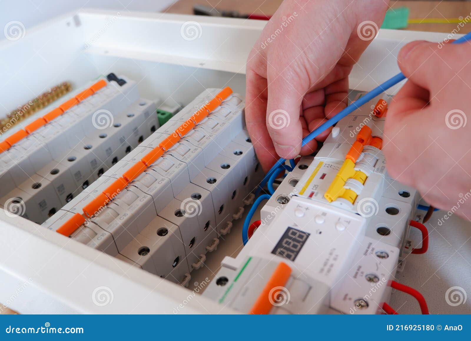 Assembling the Electrical Panel. the Engineer Makes the Connections of ...