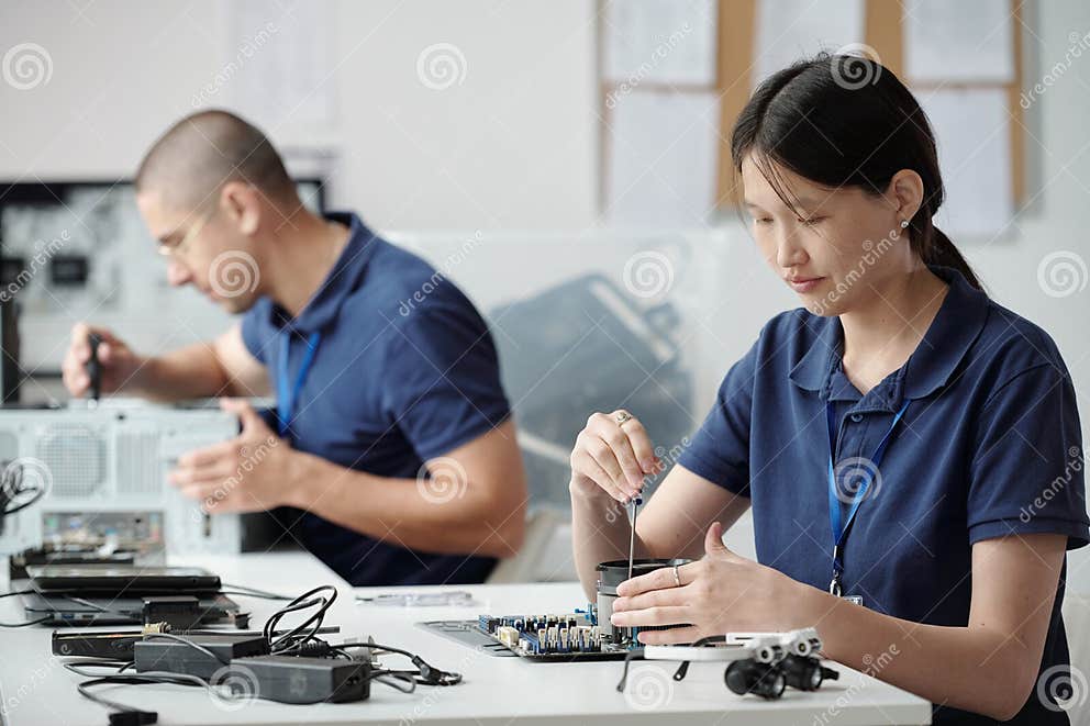 Assembling Electronic Components in Technology Workshop Stock Photo ...