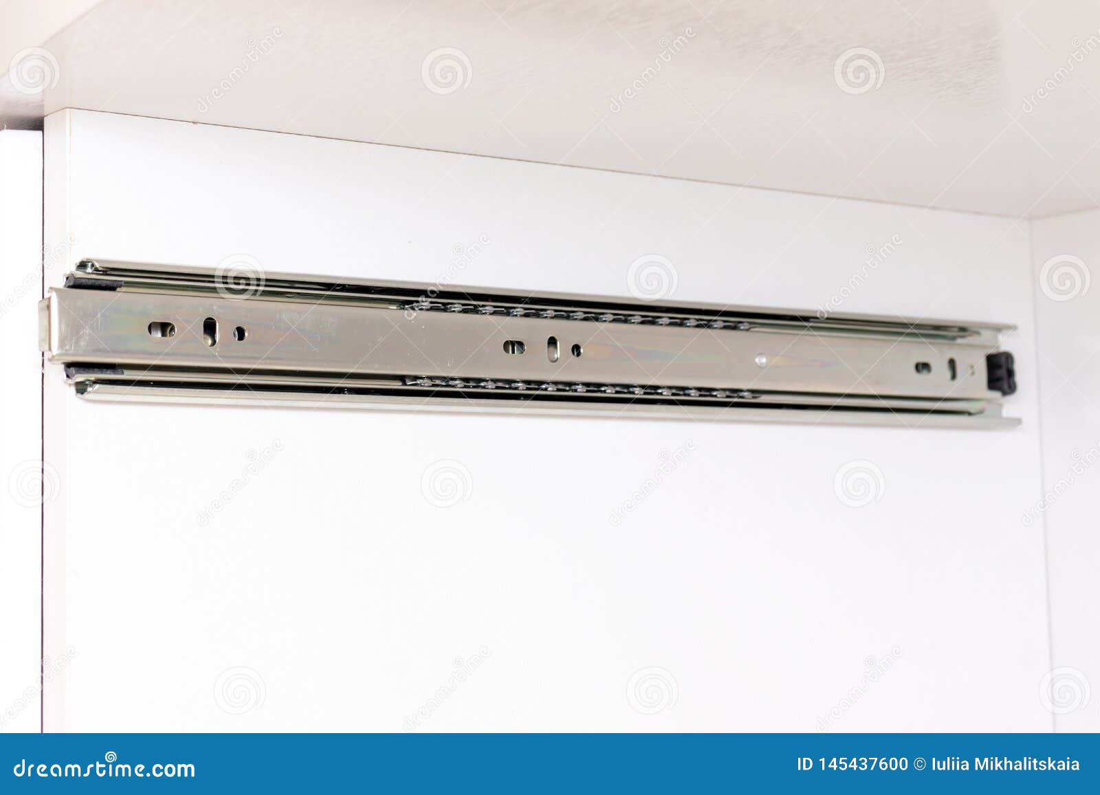 Assembling Furniture from Chipboard, Installing Roller Guide of a ...