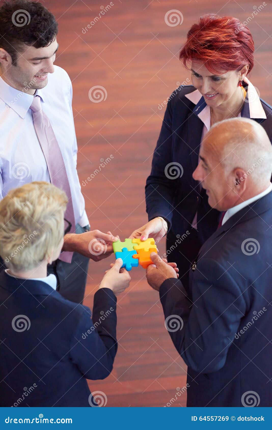 Assembling jigsaw puzzle stock image. Image of jigsaw - 64557269