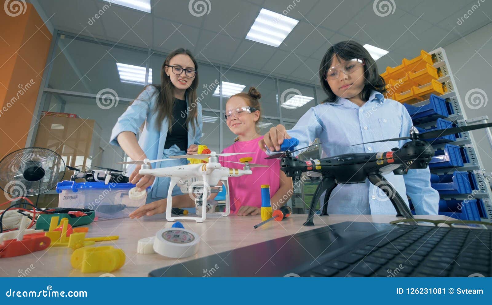 School Kids Explore Drones, Copters at Technology Class. Stock Video ...